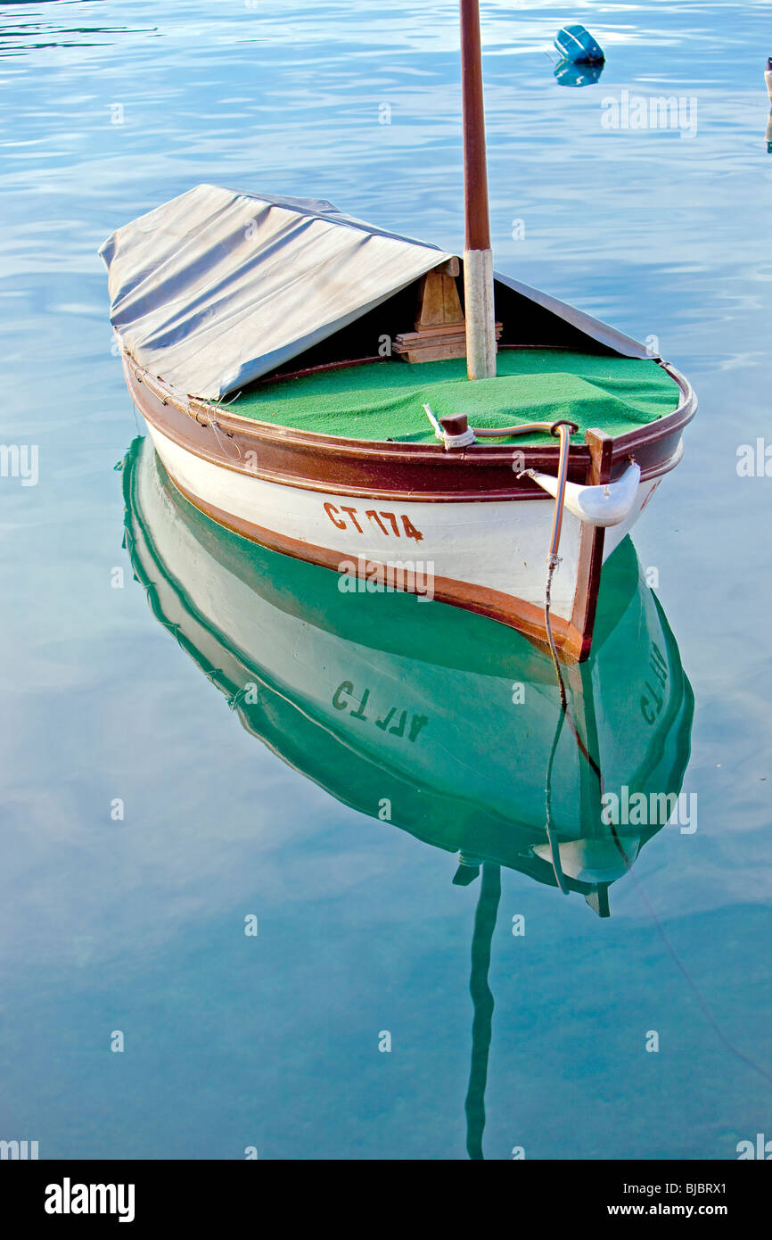 Maritime reflections of boats in a harbour Stock Photo - Alamy