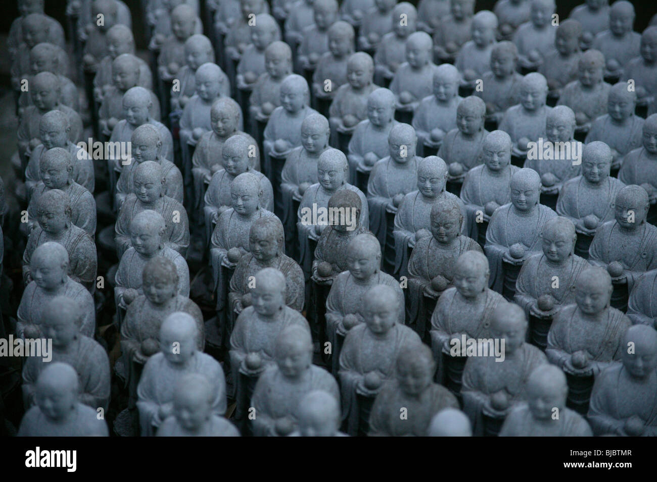 Lots of small stone statues Stock Photo - Alamy