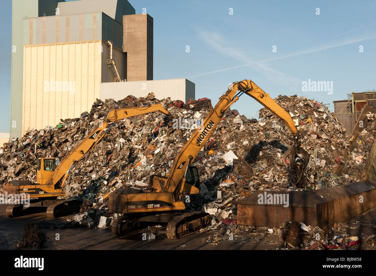 Scrap metal being processed for recycling Stock Photo - Alamy