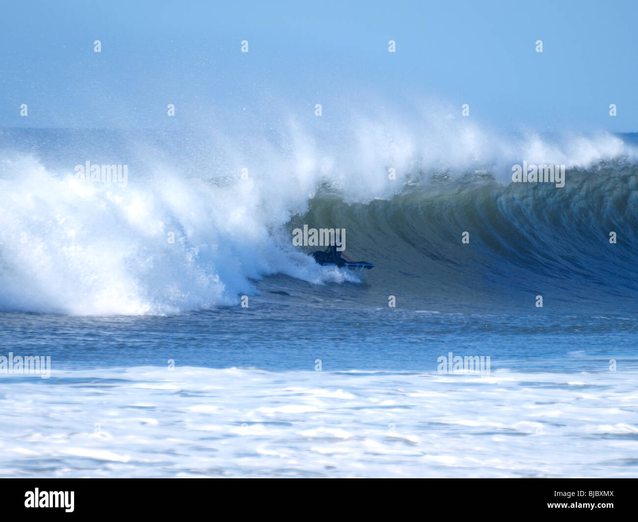 Bodyboarder surfing along the face of a wave, Cornwall Stock Photo - Alamy