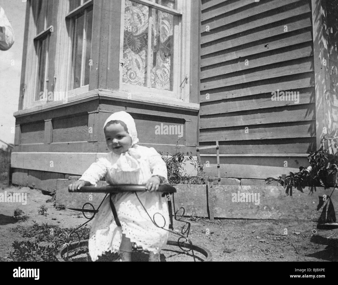 A baby outside a house at the turn of the 20th century Cairo, Illinois ...