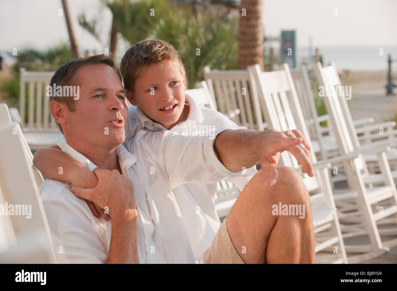 Mature man sitting in rocking hi-res stock photography and images - Alamy
