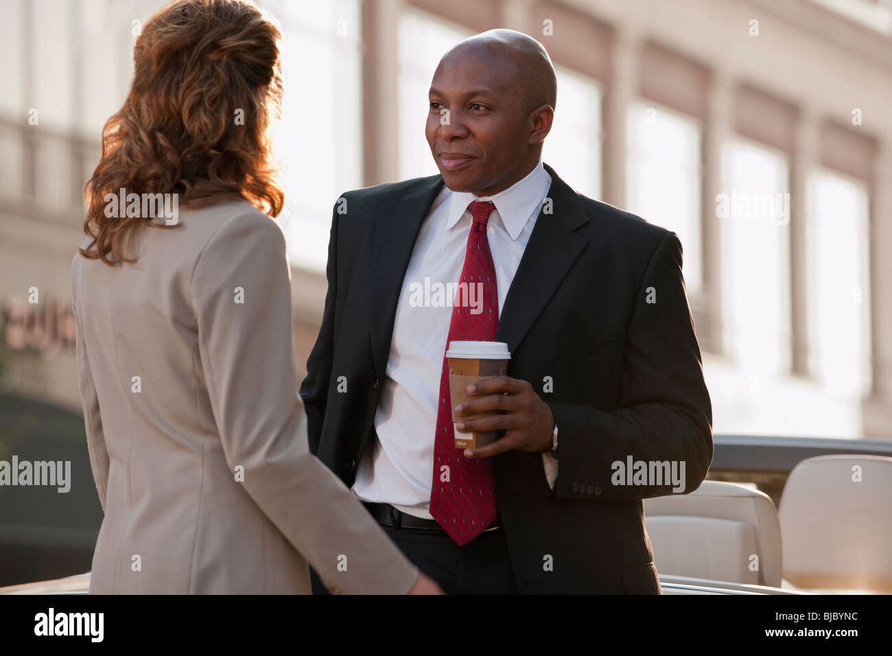 Business people talking together Stock Photo - Alamy