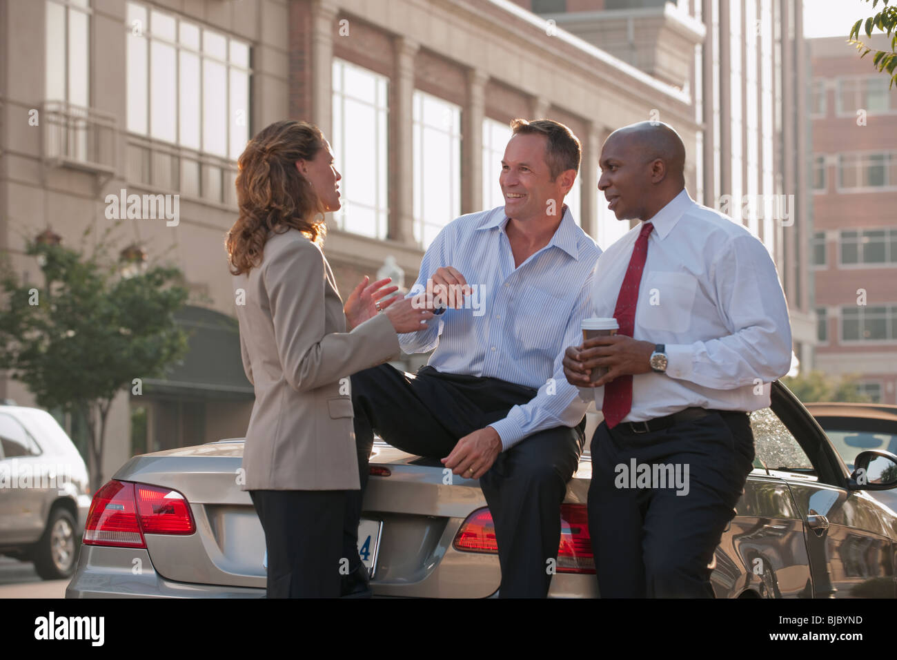 Business people talking together Stock Photo - Alamy