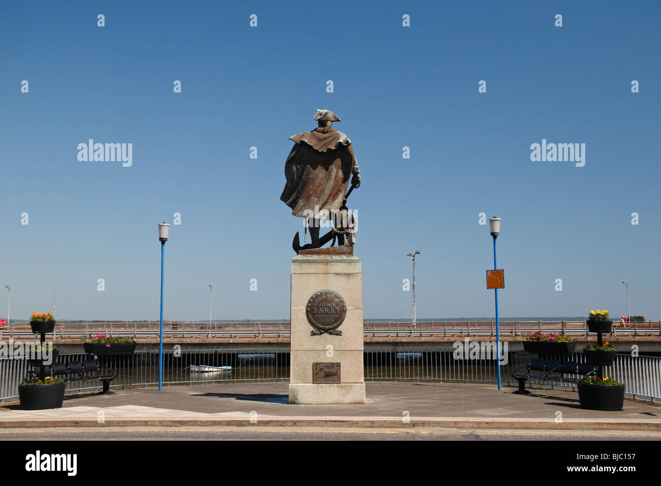 A rear view of the John Barry Memorial statue and plaque on the quay of ...