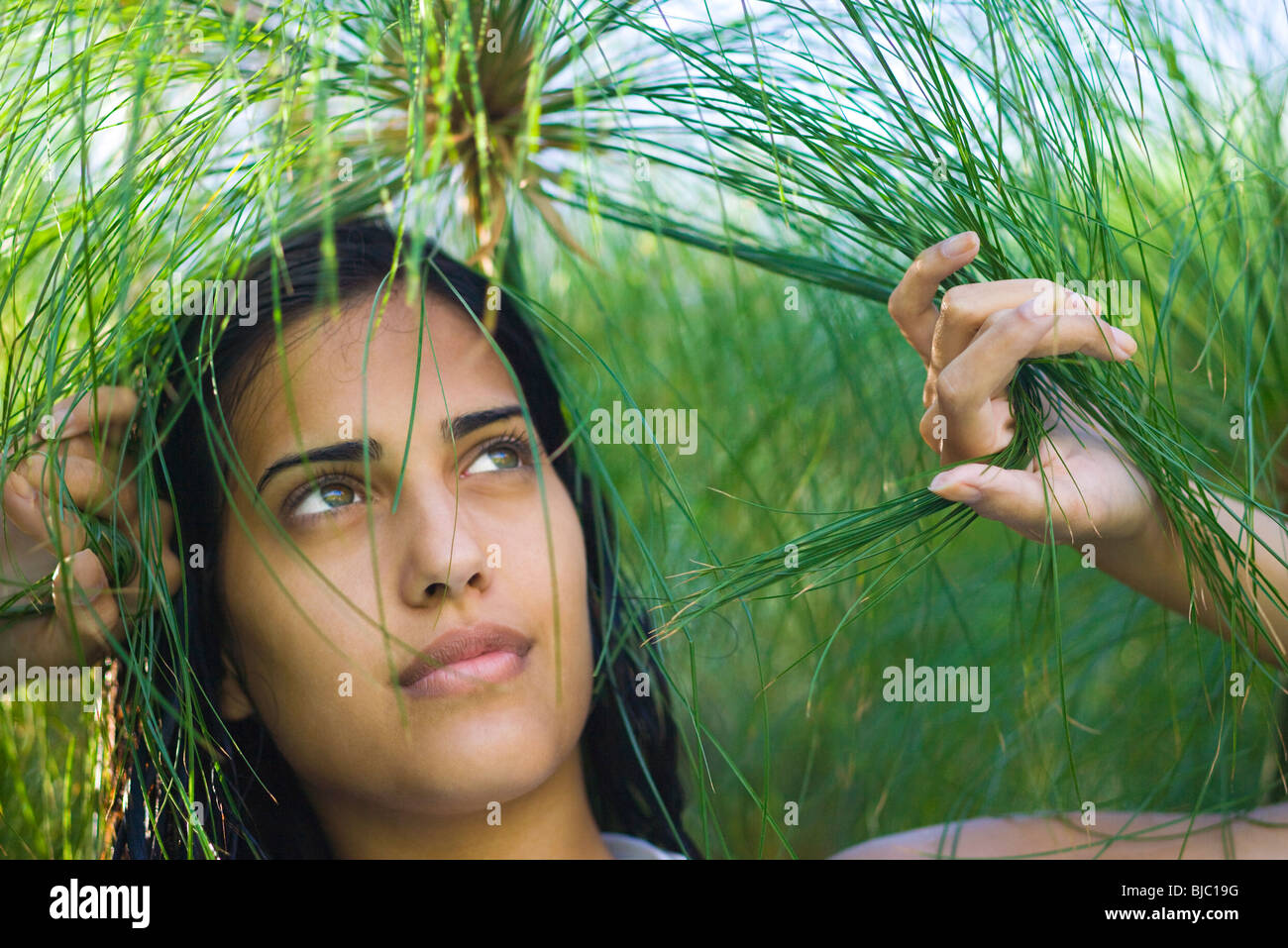 Young woman exploring tropical travel destination Stock Photo - Alamy