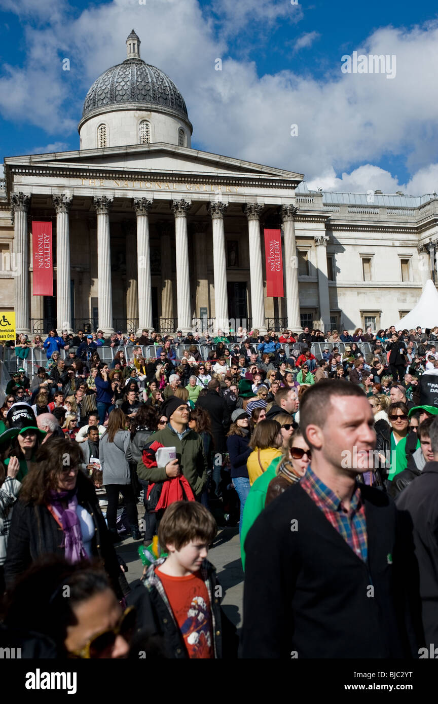 A large crowd sitting on the steps outside the National Gallery during ...