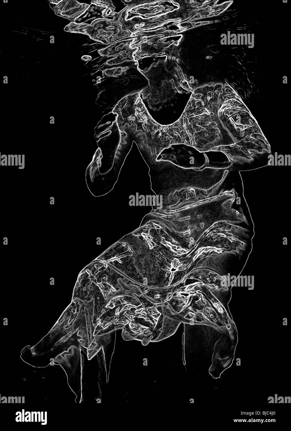 Abstract vision of a feminine figure floating in water Stock Photo - Alamy