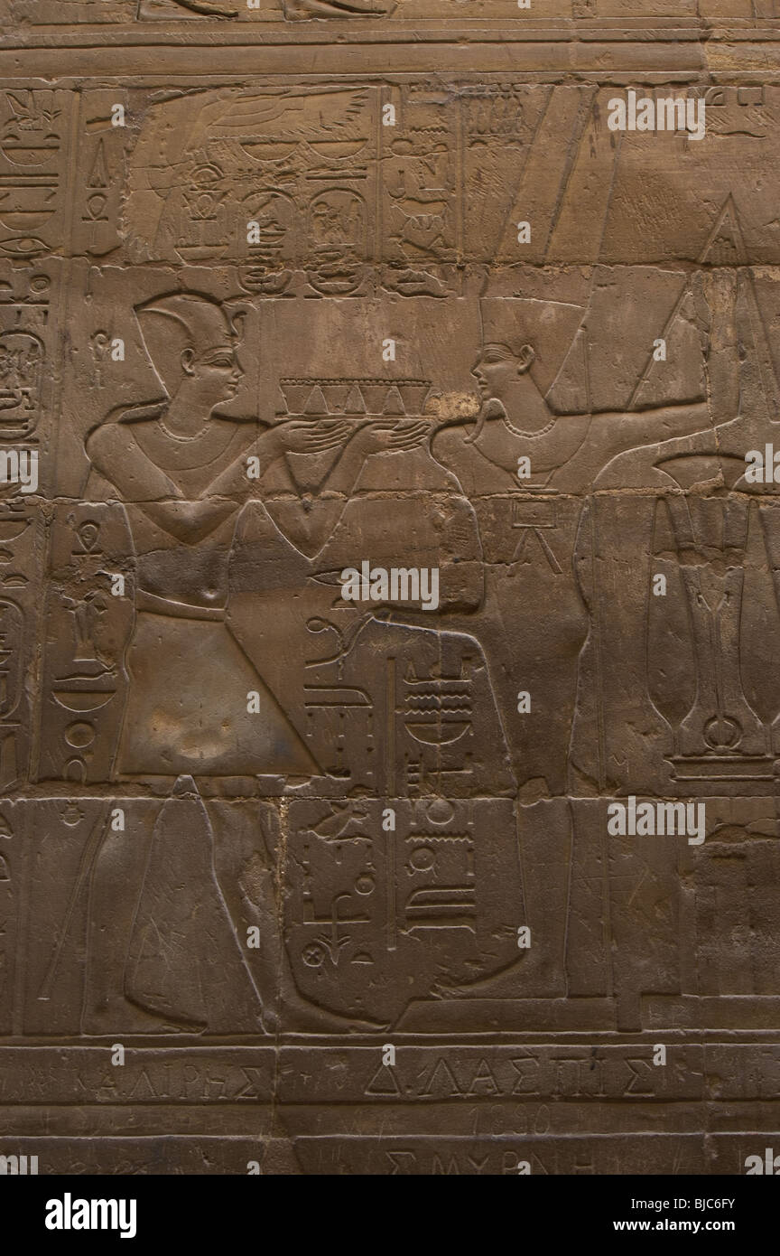 Relief depicting a pharaoh making offerings to the god MIN. Temple of ...