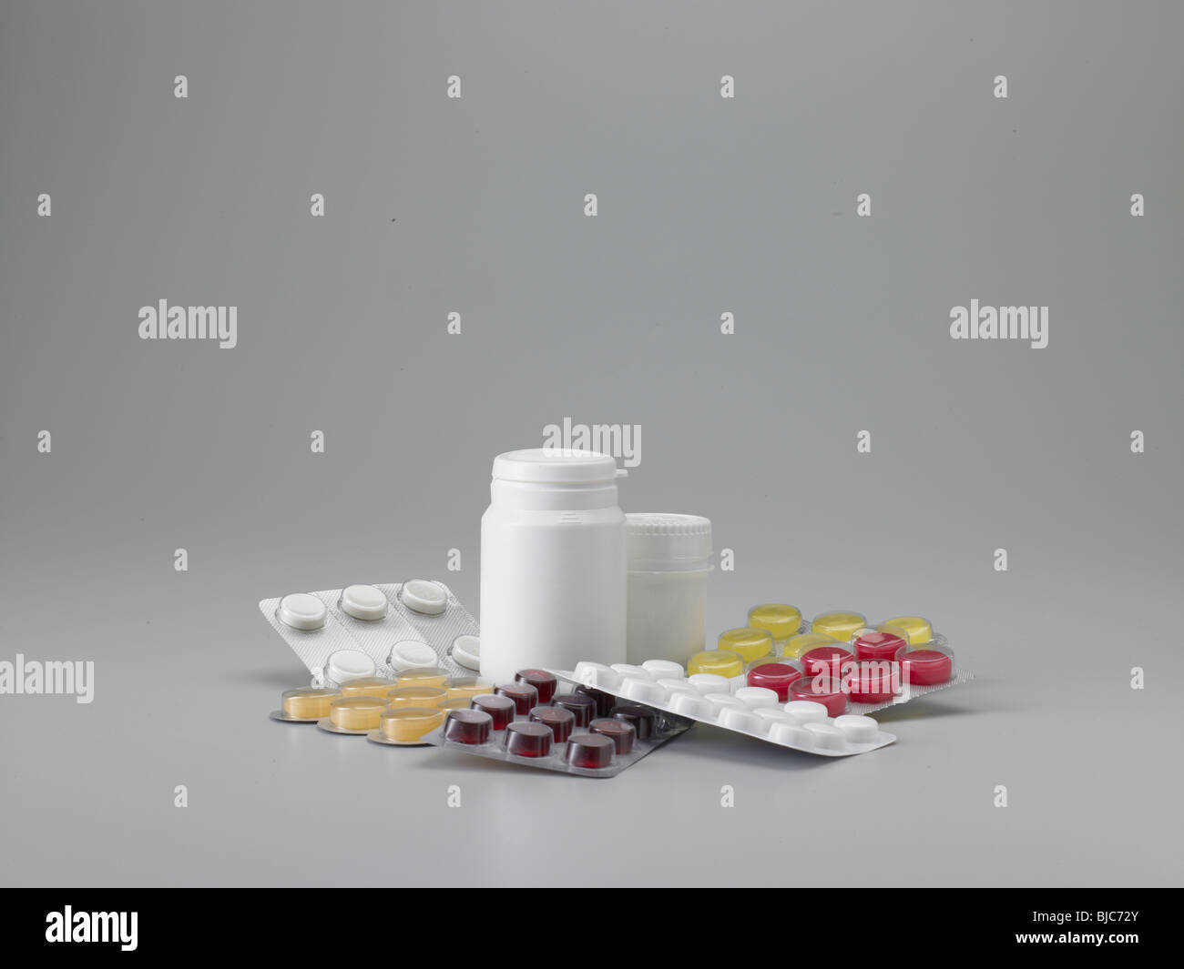 Tablets in blister packs with white containers. landscape format Stock ...