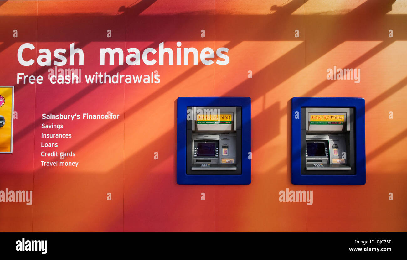 A pair of hole in the wall cash machines outside Sainsbury's store ...