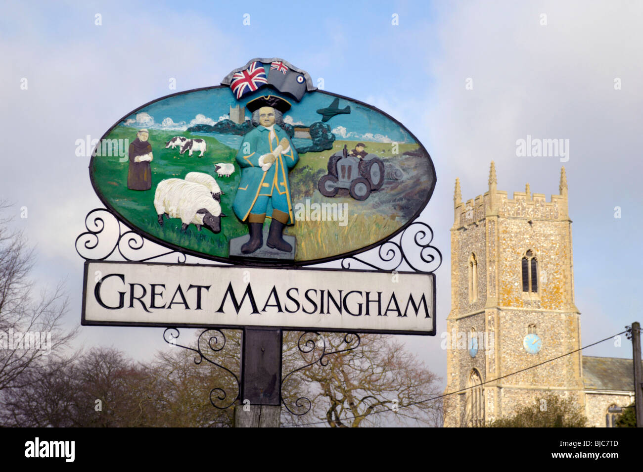 Village sign and St Mary's church, Great Massingham, Norfolk Stock ...
