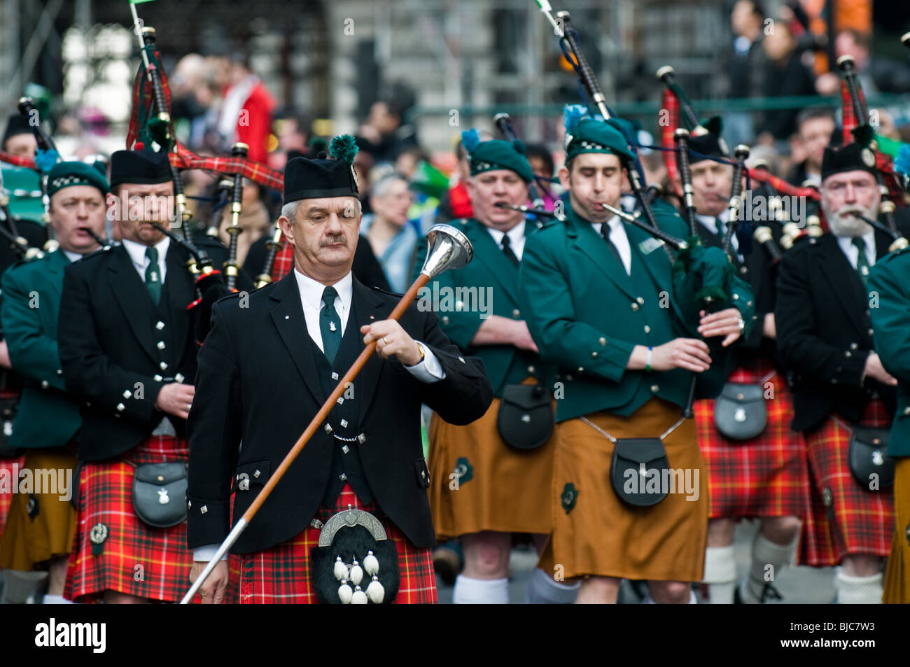 A pipe band marching in the St Patricks Day Parade in London Stock ...