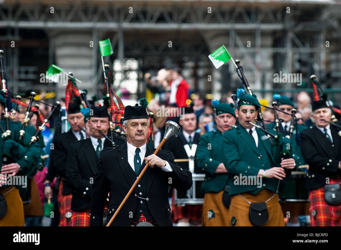 A pipe band marching in the St Patricks Day Parade in London Stock ...