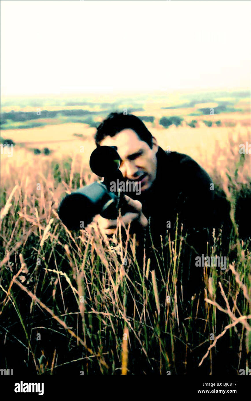 man looking down gun sights Stock Photo - Alamy