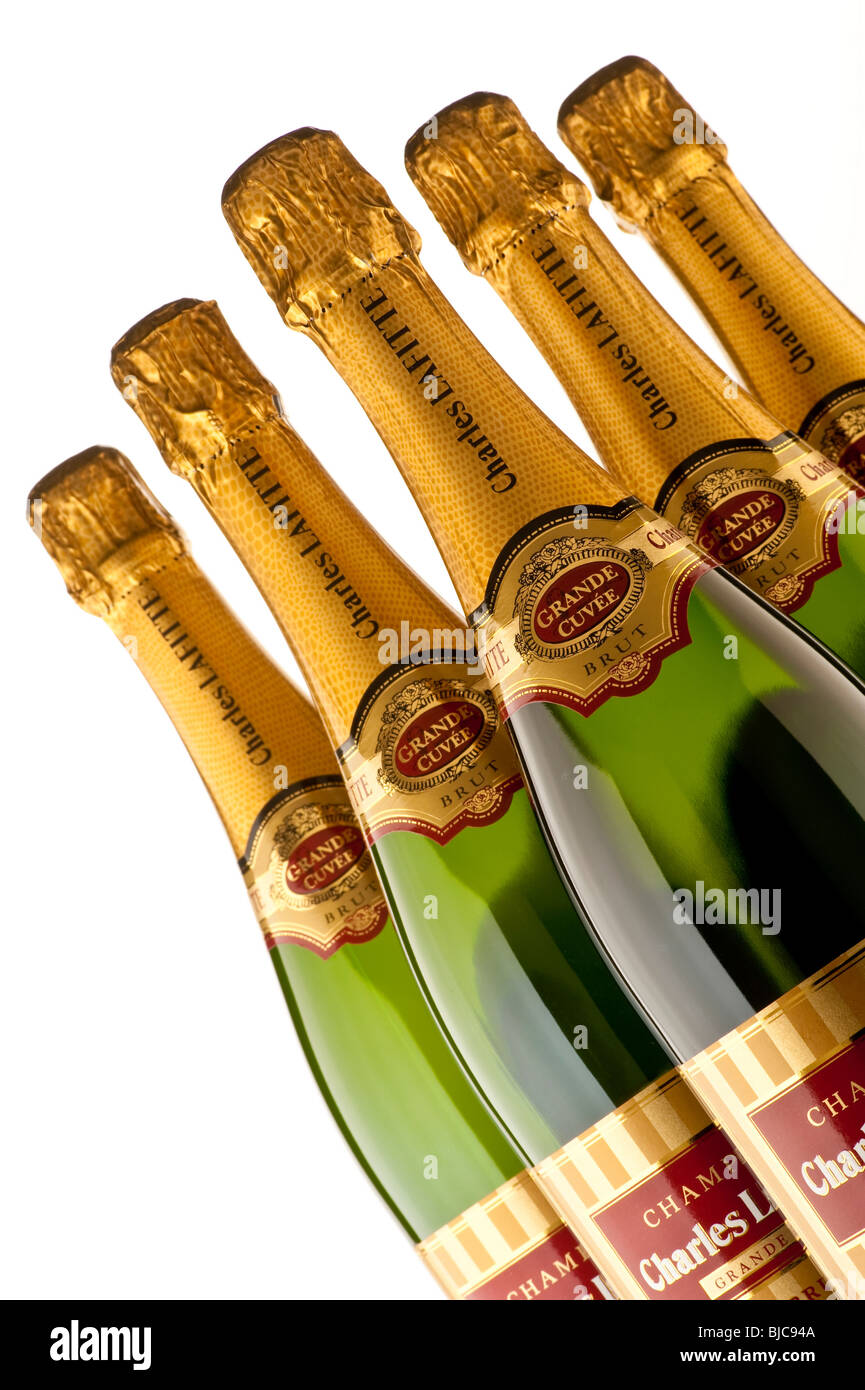 Studio shot of angled Champagne bottles on white background Stock Photo ...