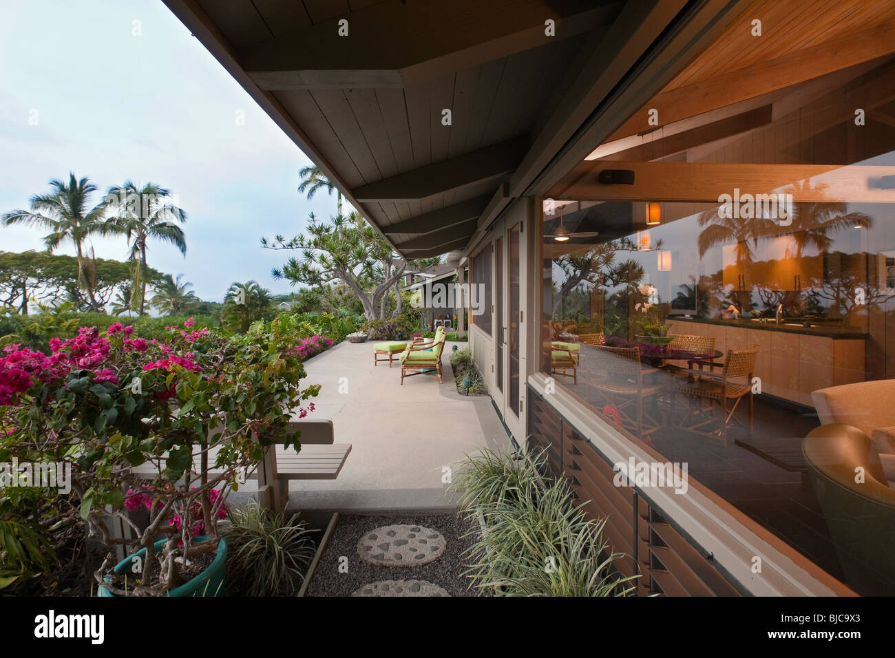 Exterior of luxury home with interior view through window Stock Photo ...