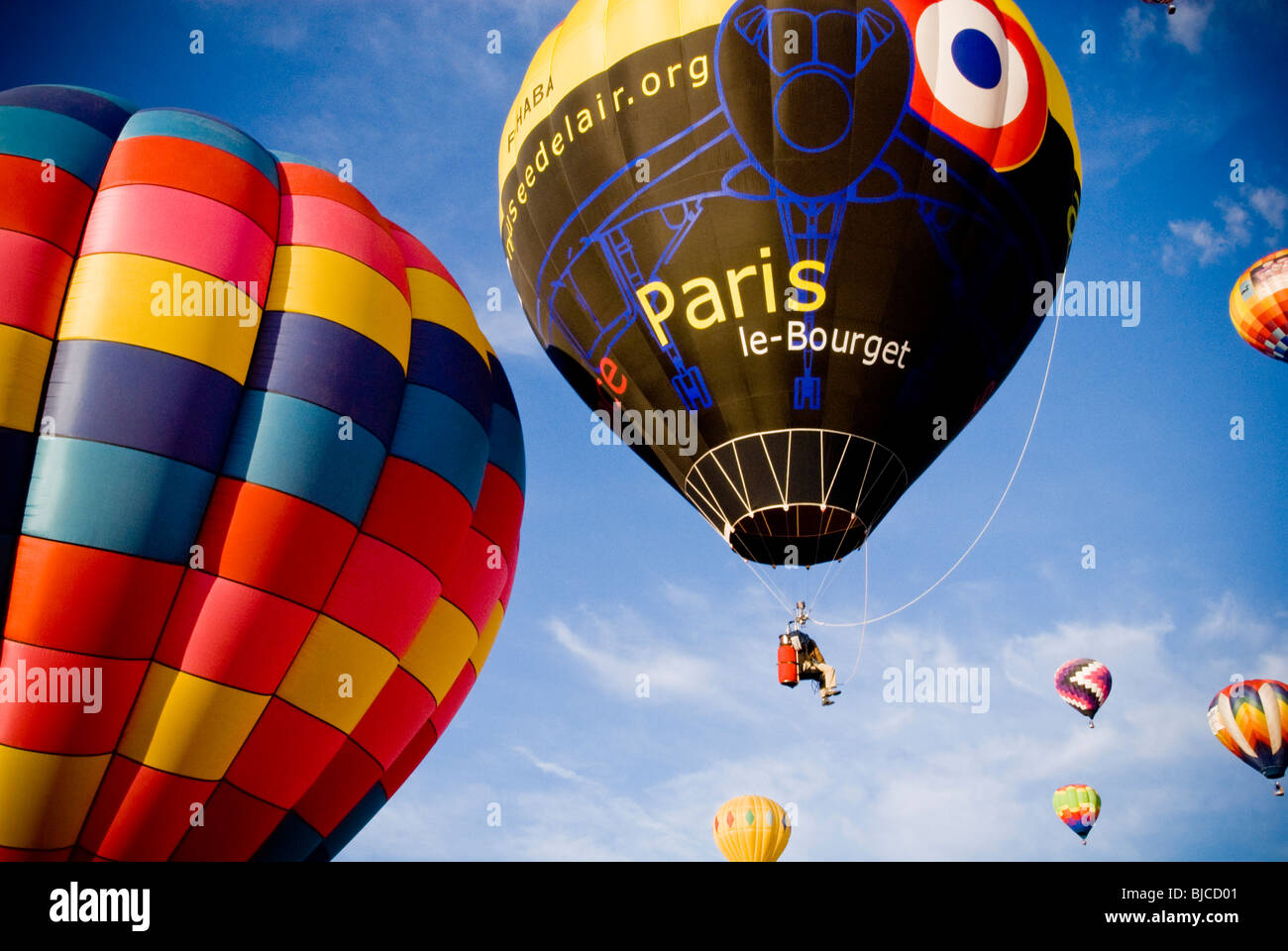Man flying hot air balloon Stock Photo - Alamy