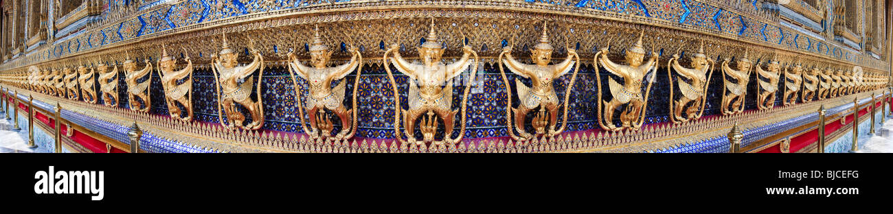 Panorama of golden demon statue temple decoration at Wat prakaew ...