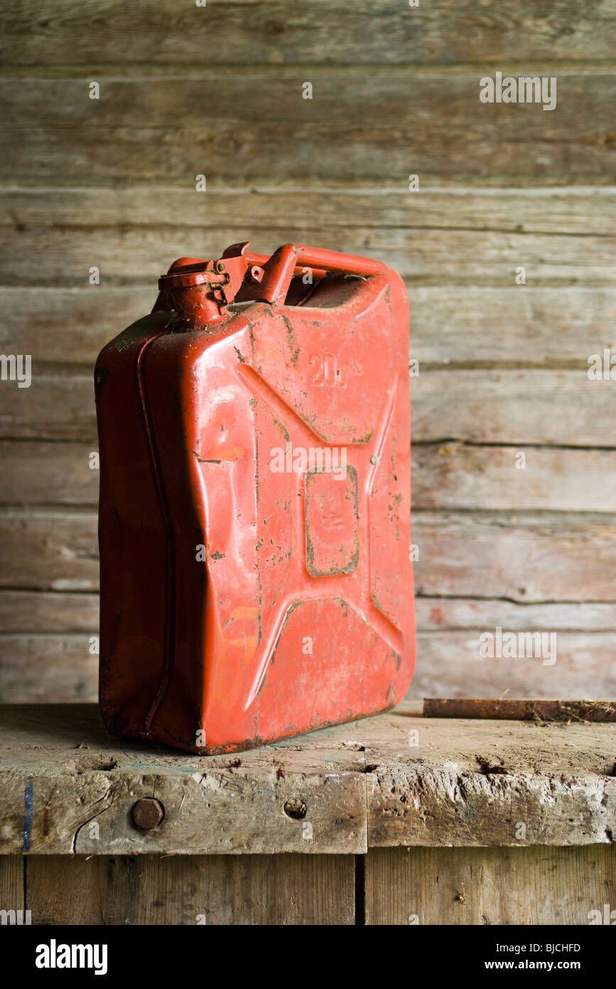 Gas can on shelf Stock Photo - Alamy
