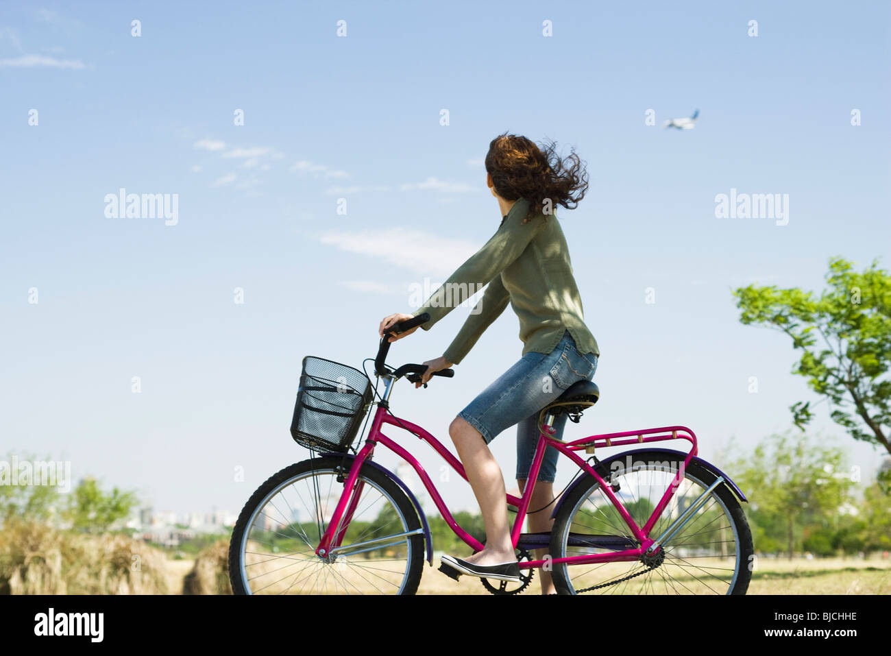 Woman riding airplane hi-res stock photography and images - Alamy