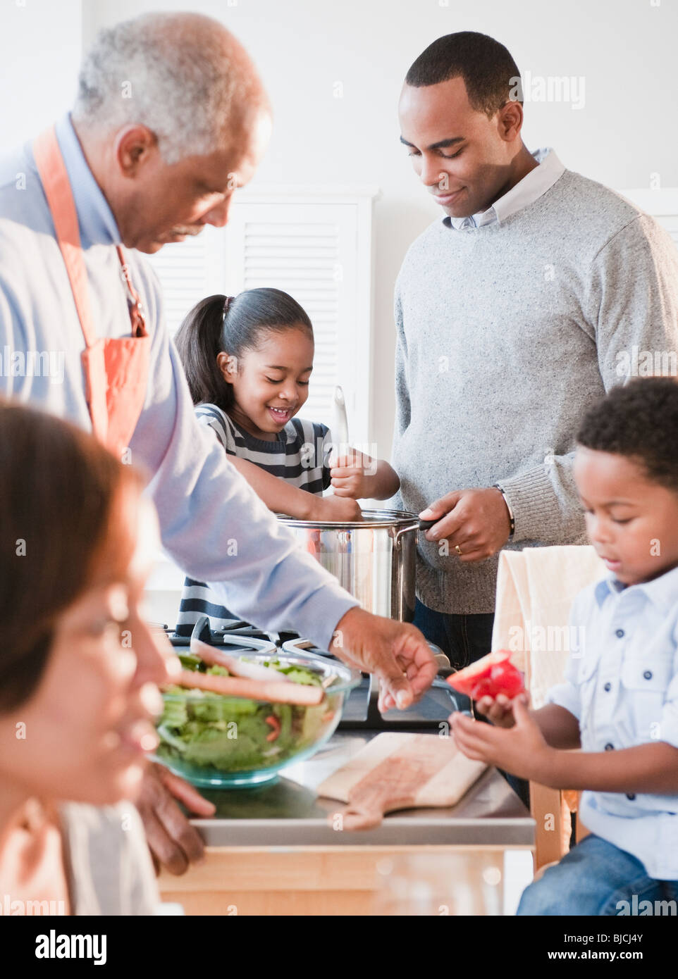 African American family cooking together Stock Photo - Alamy