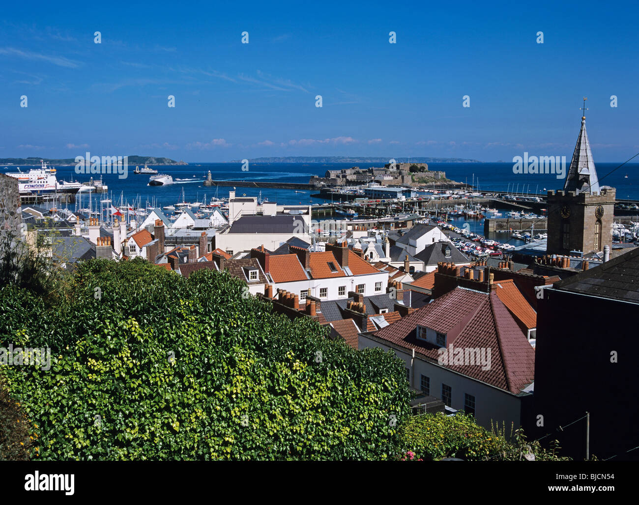 Town and harbour at St Peter Port, Guernsey's capital Stock Photo - Alamy