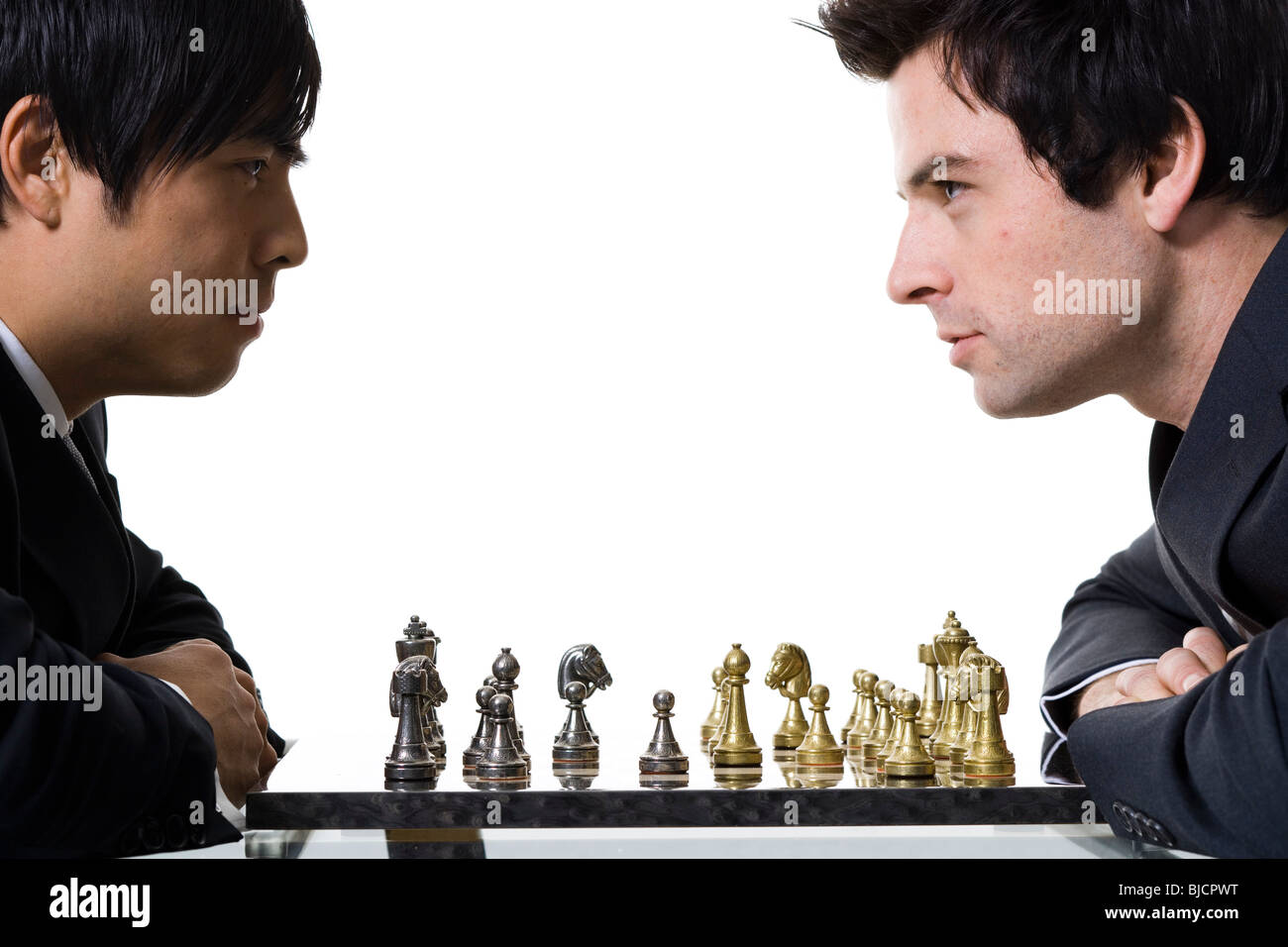 Men playing chess Stock Photo - Alamy