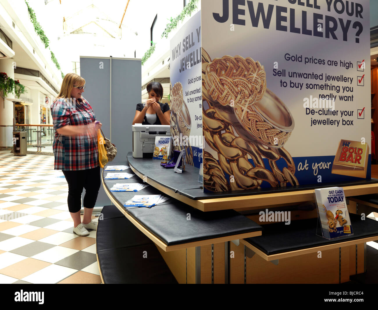Customer Getting Gold Valued At Gold Bar in a Shopping Mall Gold ...