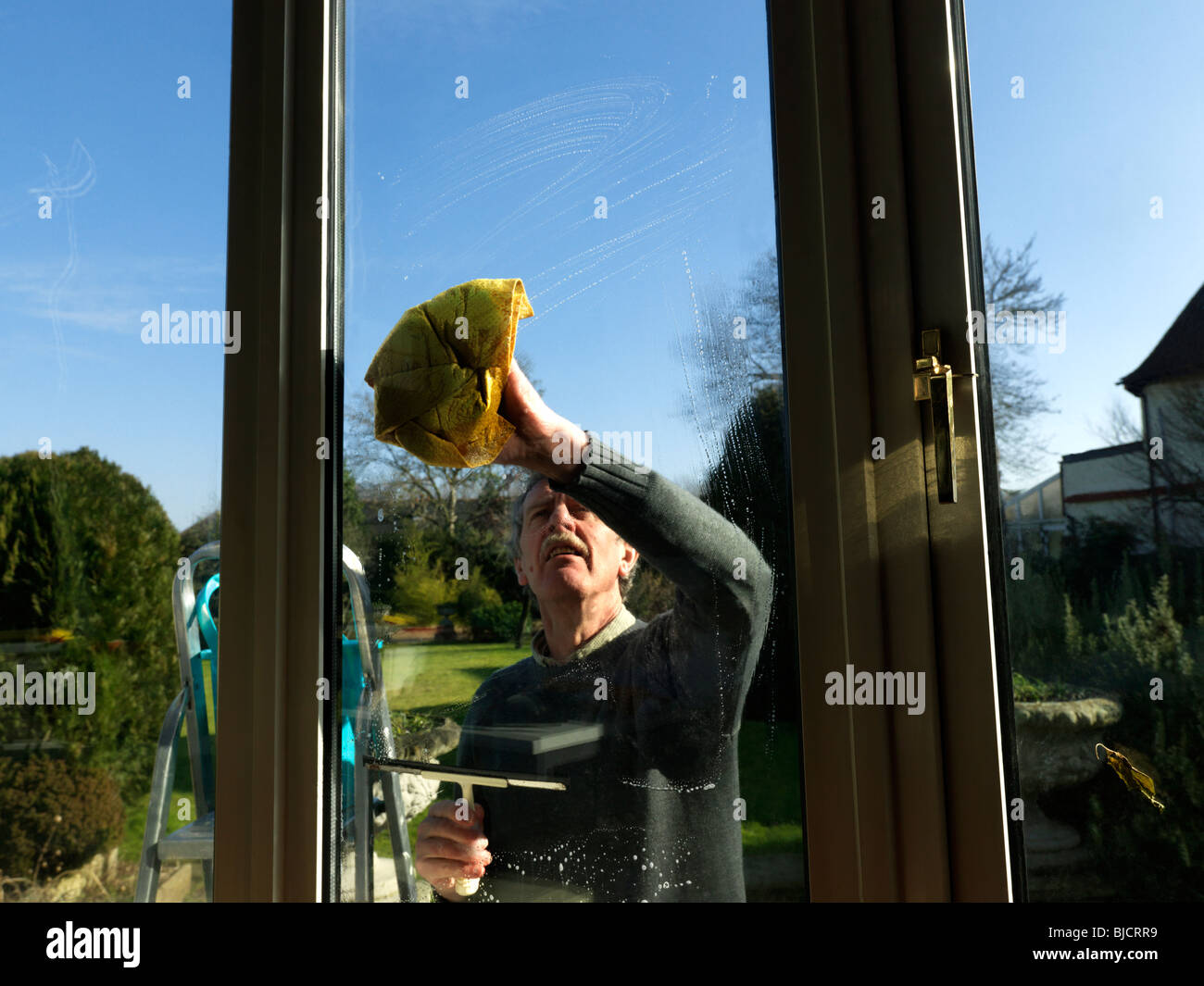 A window Cleaner Taken from the Inside Stock Photo - Alamy