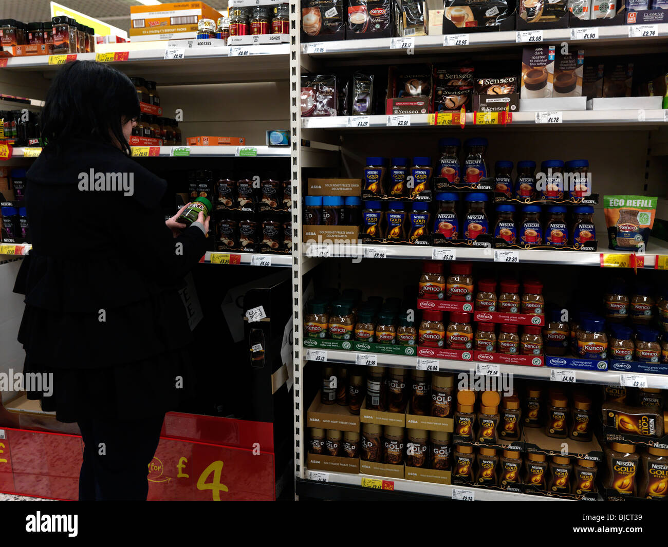 Teenager Choosing Coffee in a Supermarket Stock Photo - Alamy