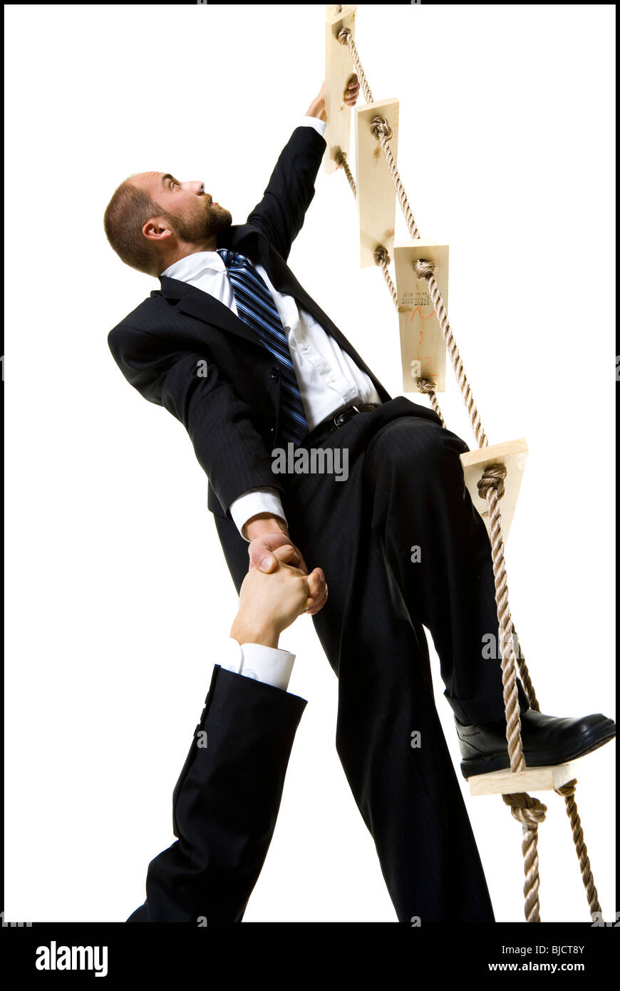 Two men climbing ladder hi-res stock photography and images - Alamy