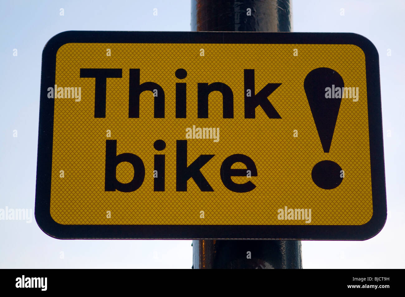 Warning sign saying think bike in London Stock Photo - Alamy
