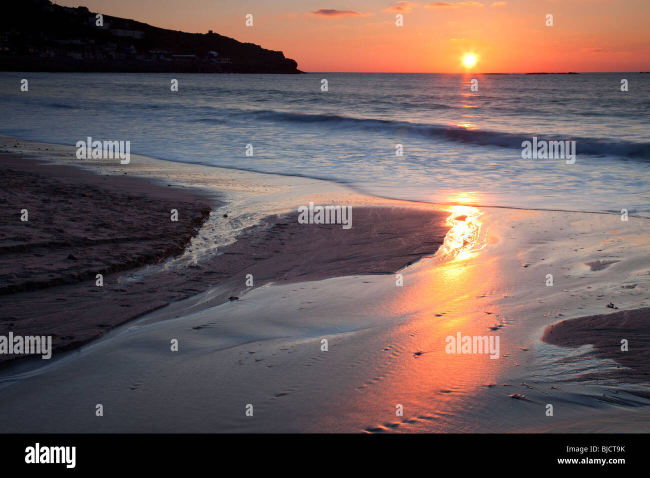 Sunset on the beach at Sennen Cove, Cornwall England UK Stock Photo - Alamy