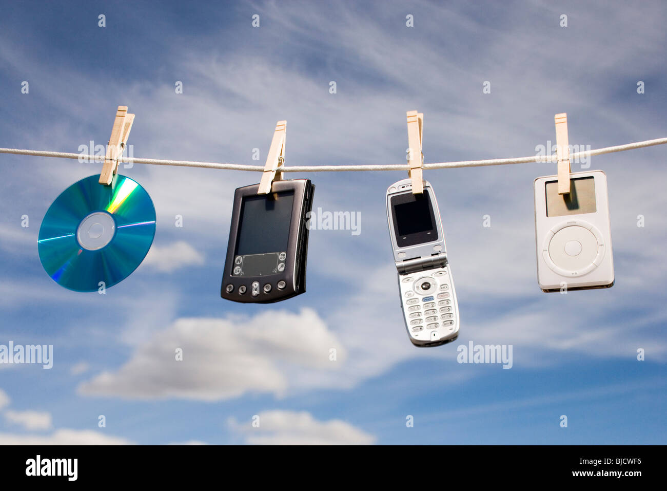 Technology on clothesline Stock Photo - Alamy