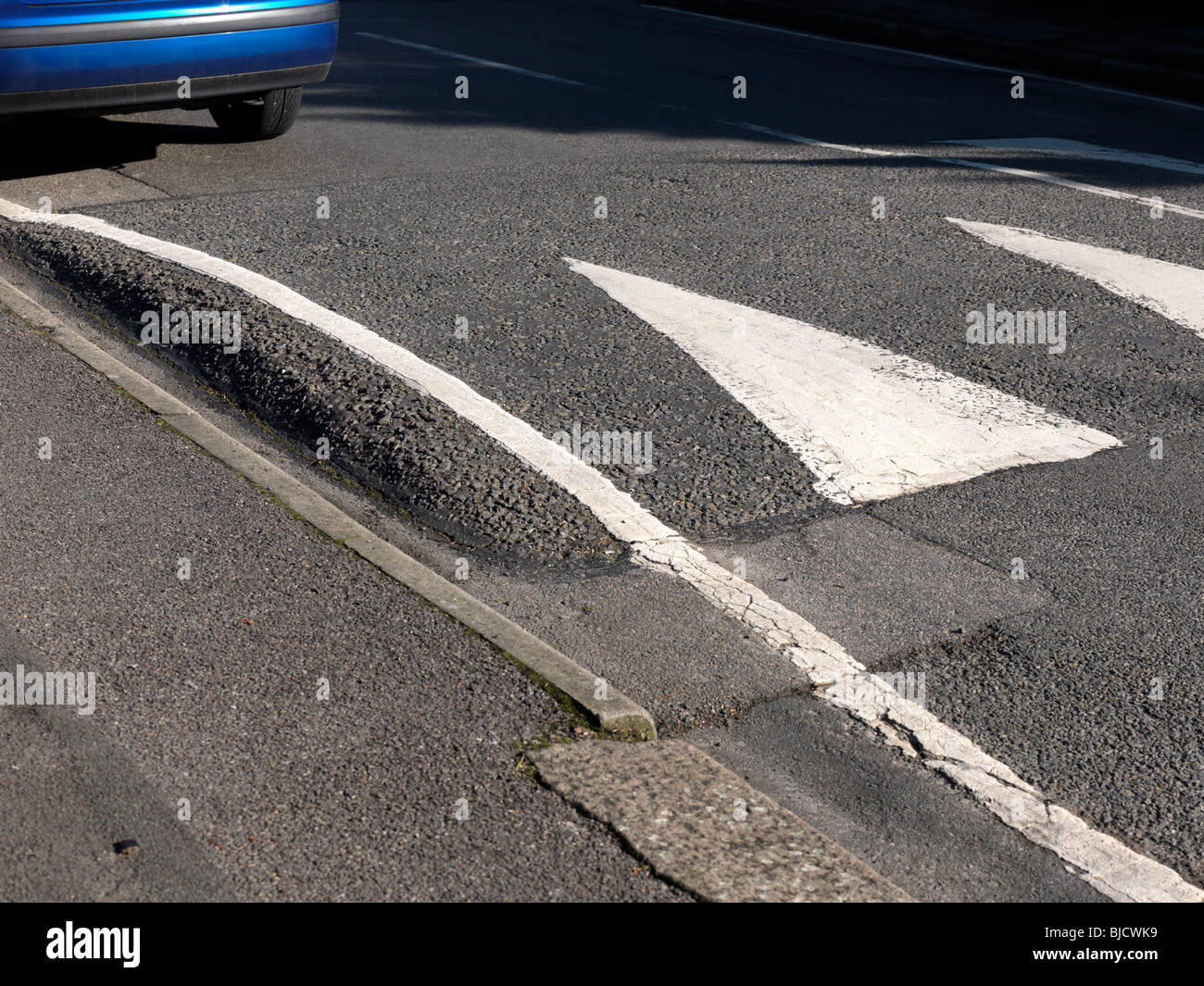 Speed bump sleeping policeman hi-res stock photography and images - Alamy