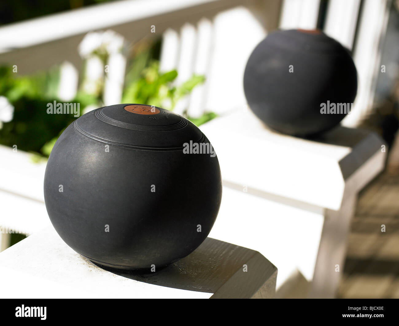 Two bannister tops made from bowls, outside a house Stock Photo - Alamy