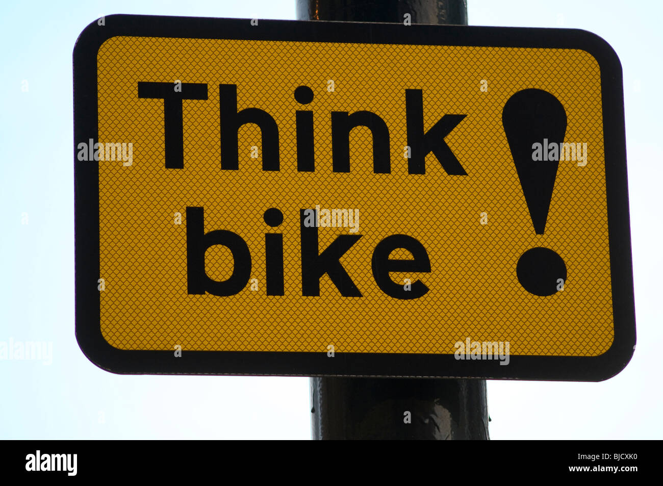 Warning sign saying think bike in London Stock Photo - Alamy