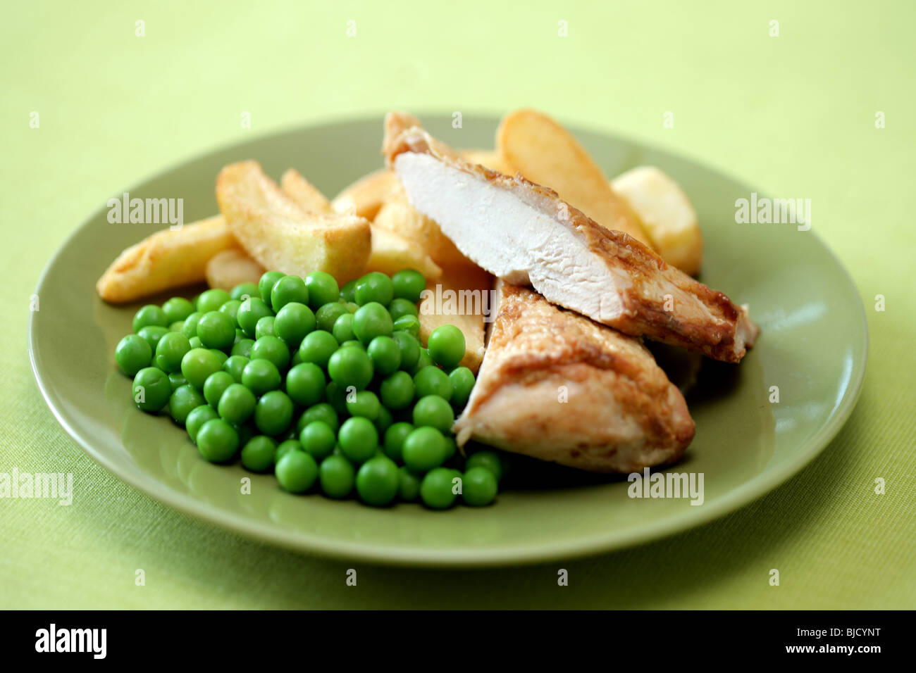 Chicken Chips and Peas Stock Photo - Alamy