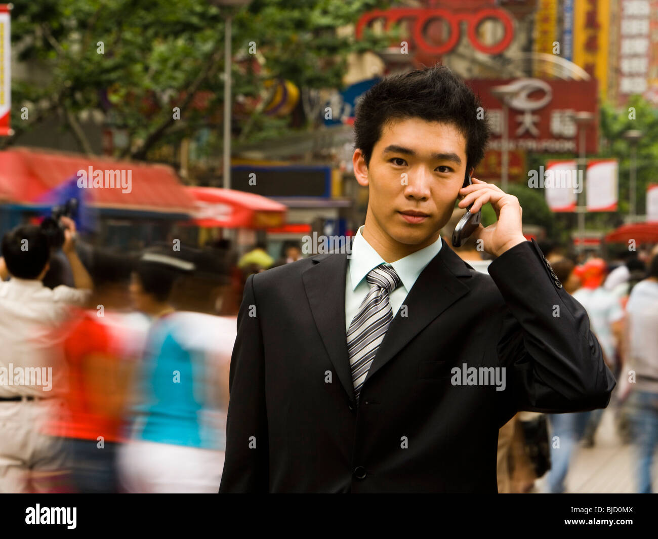 Man with a cell phone Stock Photo - Alamy