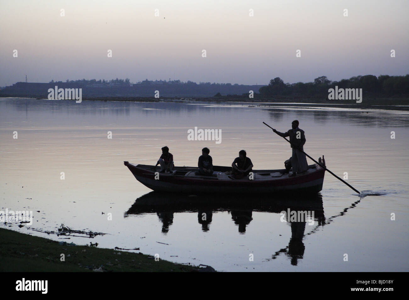 Man rowing boat in Yamuna River ; Agra ; Uttar Pradesh ; India Stock ...