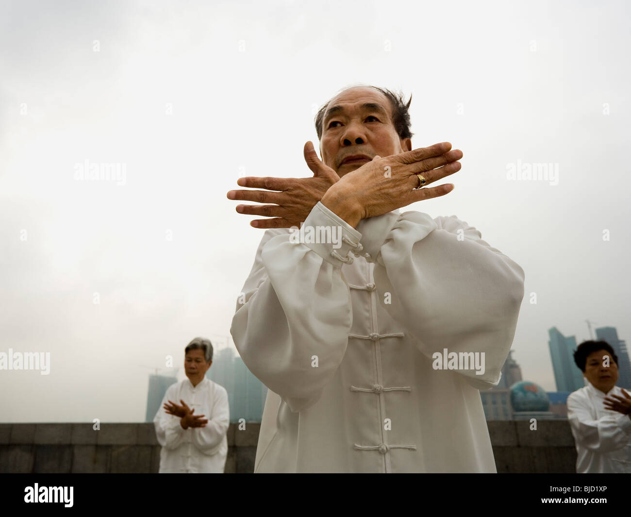 People practicing Tai Chi Stock Photo - Alamy