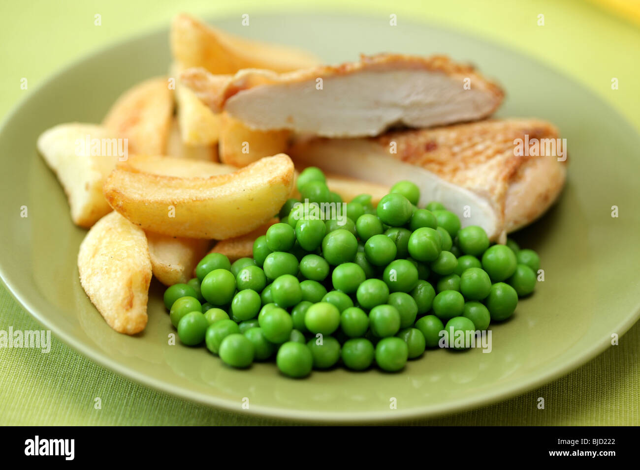 Chicken Chips and Peas Stock Photo - Alamy