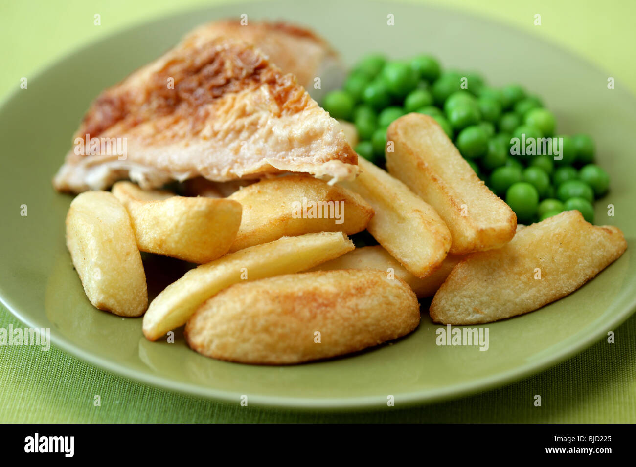Chicken Chips and Peas Stock Photo - Alamy