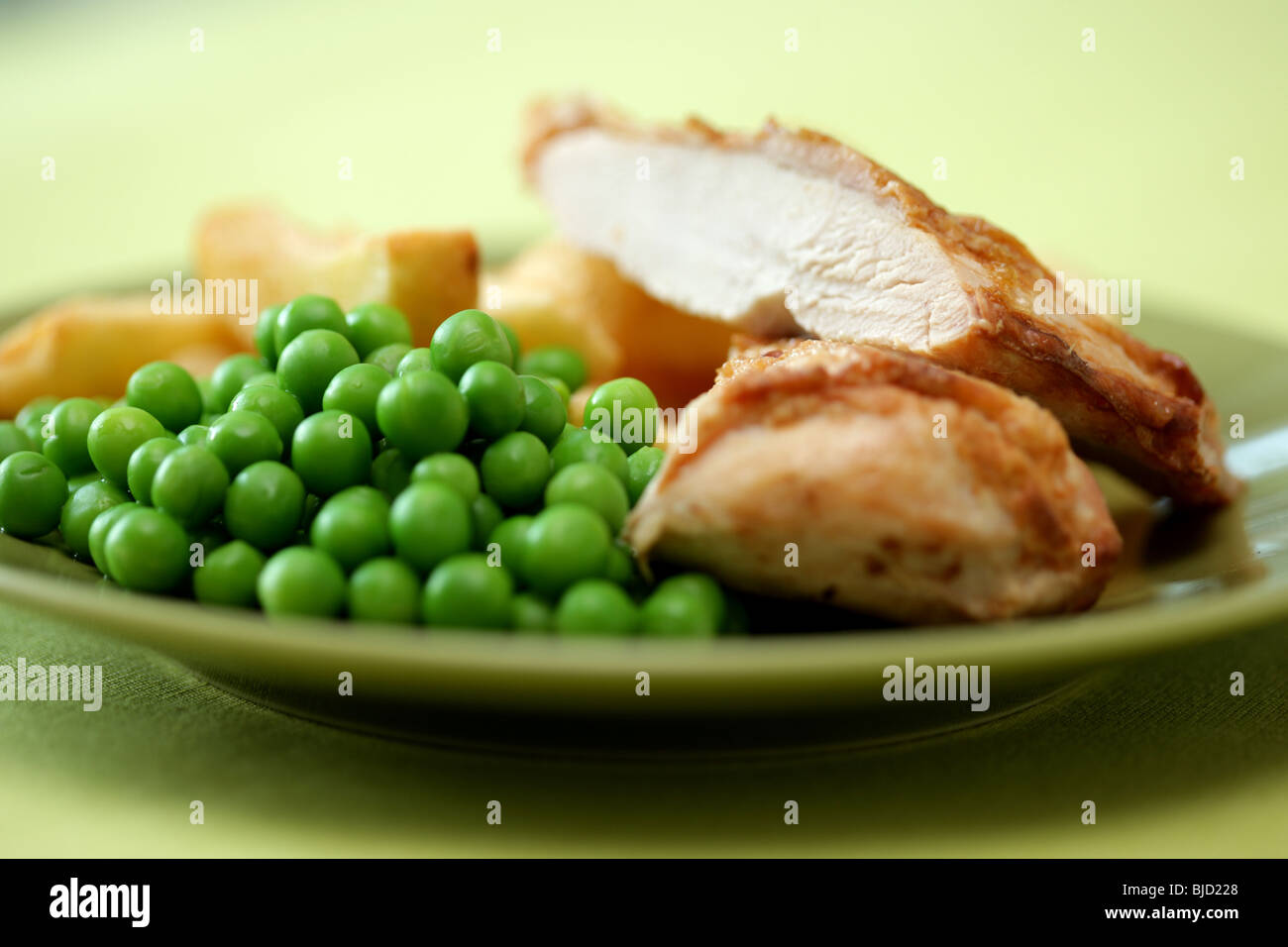 Chicken Chips and Peas Stock Photo - Alamy
