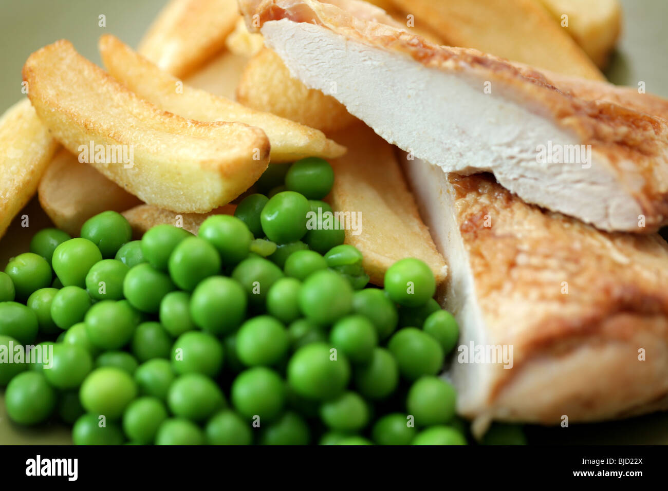 Chicken Chips and Peas Stock Photo - Alamy