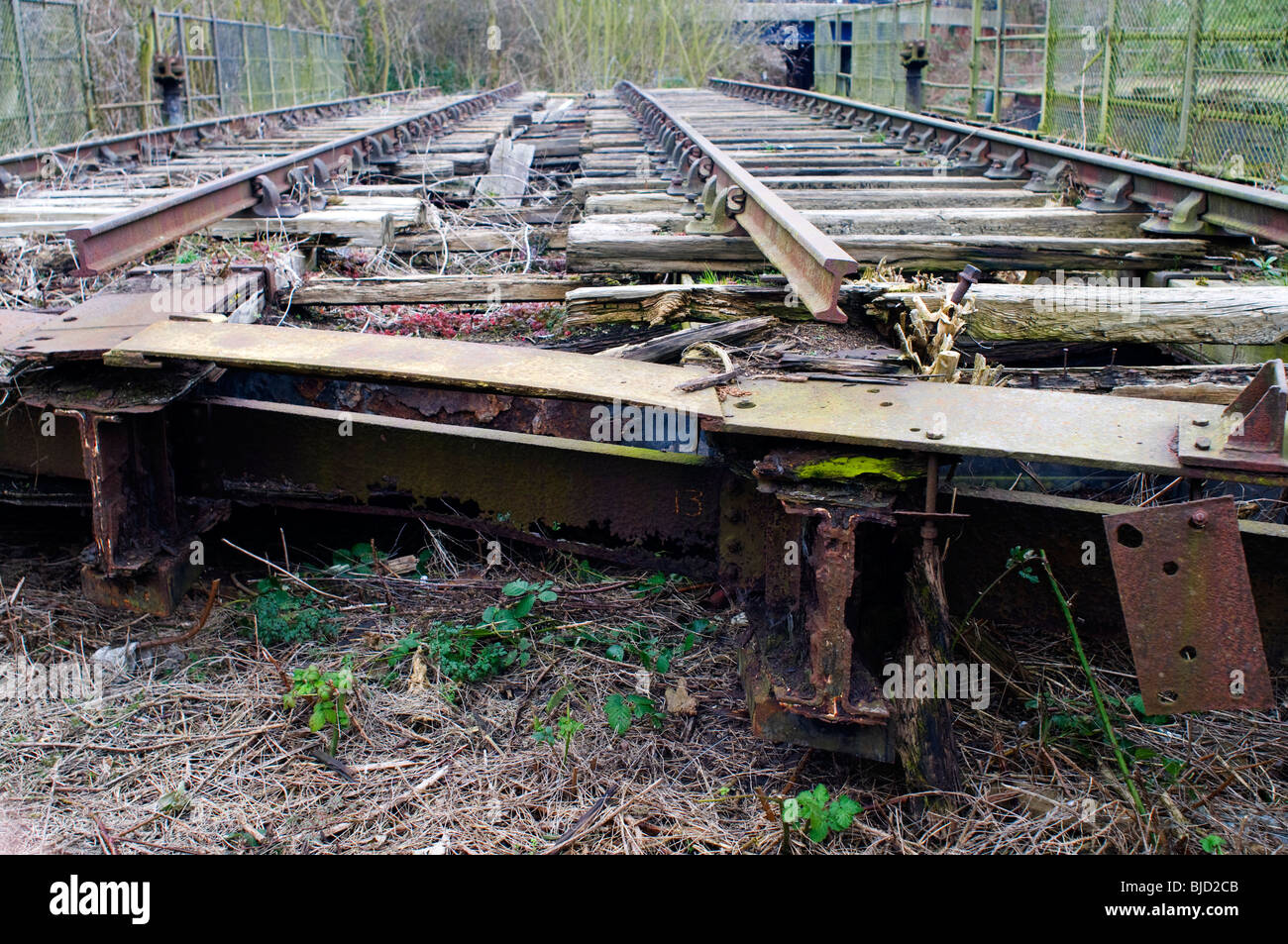 a disused and derelict rail swing bridge over the Oxford canal on the ...