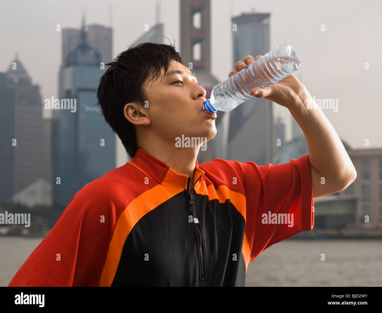 Man drinking bottled water Stock Photo - Alamy