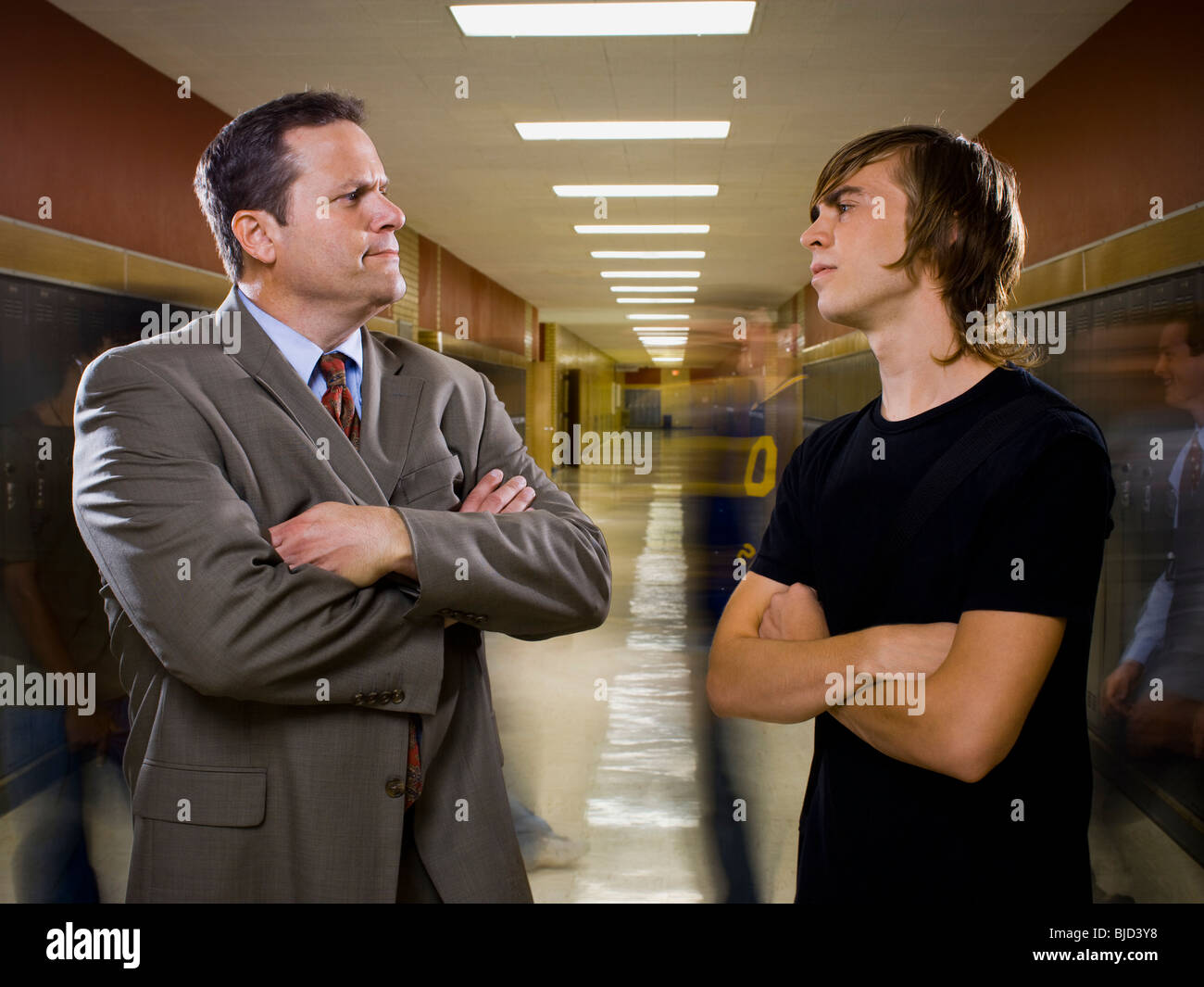 High School Principal stands with a student Stock Photo - Alamy