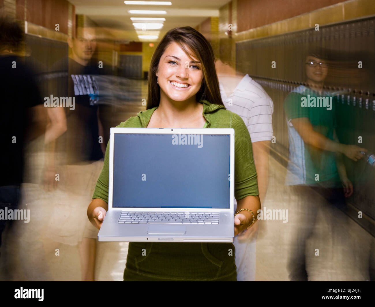 High School girl at school with a notebook computer Stock Photo - Alamy